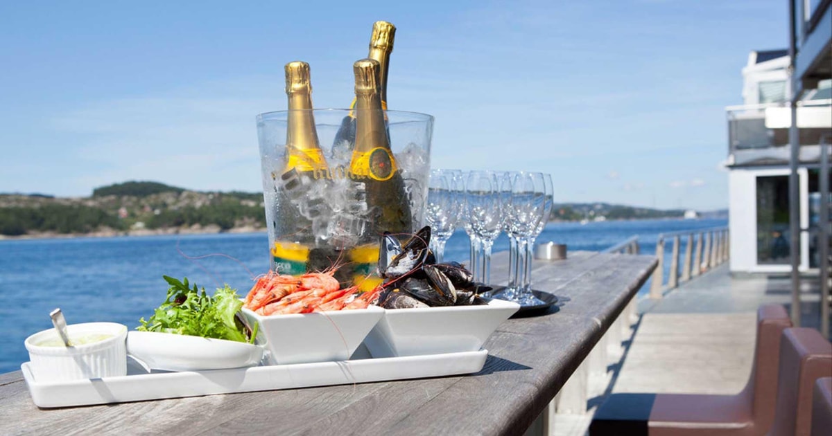 Helicopter + lunch at Cornelius Seafood Restaurant | GetYourGuide