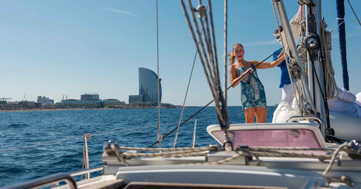 Barcelona: Sailing Tour with Drinks and Swim Stop | GetYourGuide