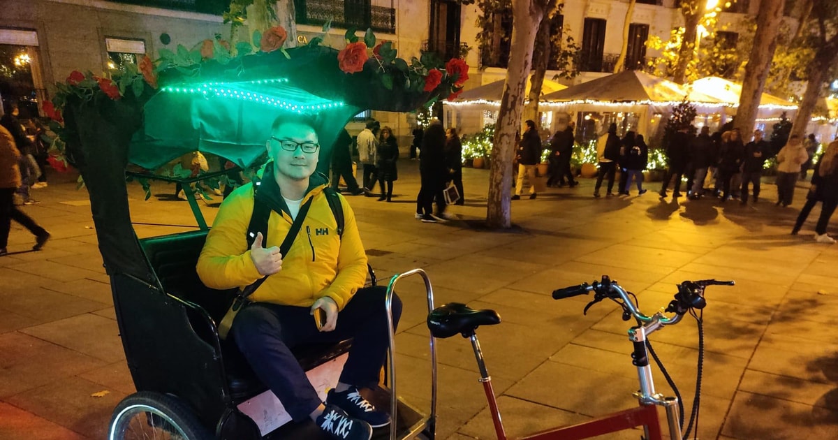 Christmas lights on rickshaw Madrid | GetYourGuide