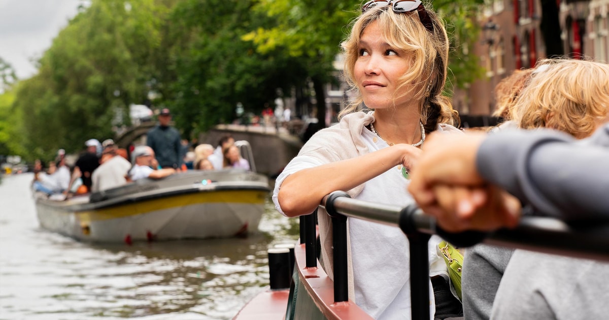 Amsterdam: Kulturelle Hop-On/Hop-Off-Bootsfahrt Stadtrundfahrt | GetYourGuide