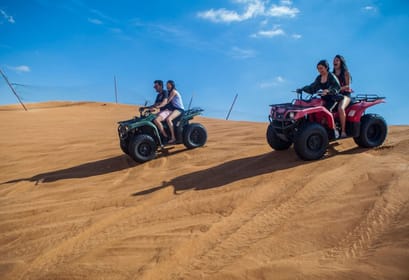 Dubai: Desert Safari, Quad Bike, Camel Ride and Sandboarding | GetYourGuide