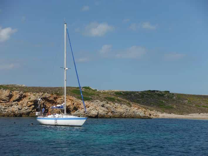 Sailboat full day excursion-Fornells | GetYourGuide