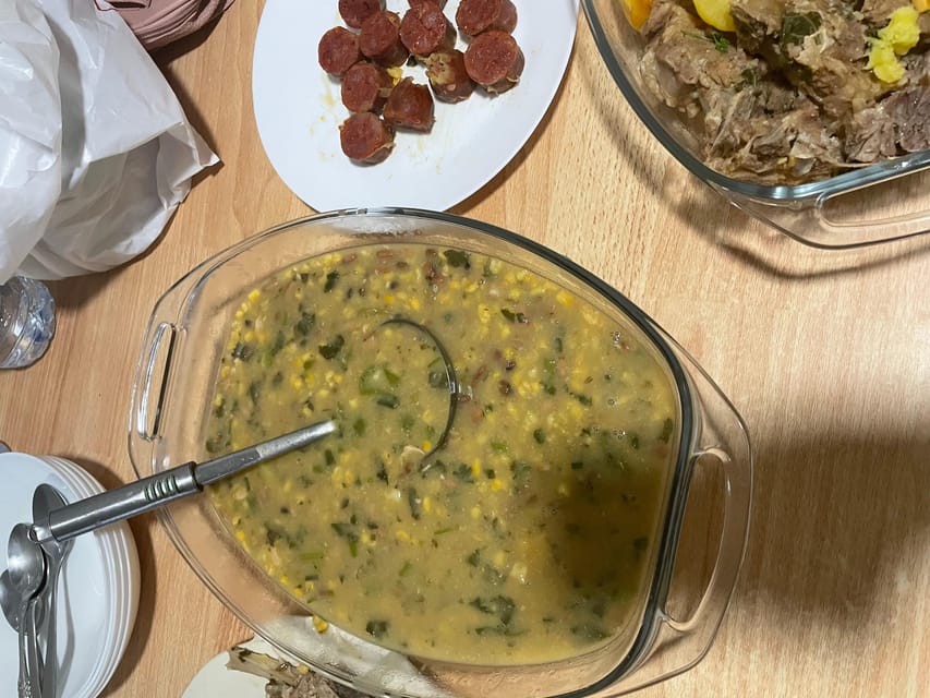 Catchupa cooking and eating ;)- | GetYourGuide