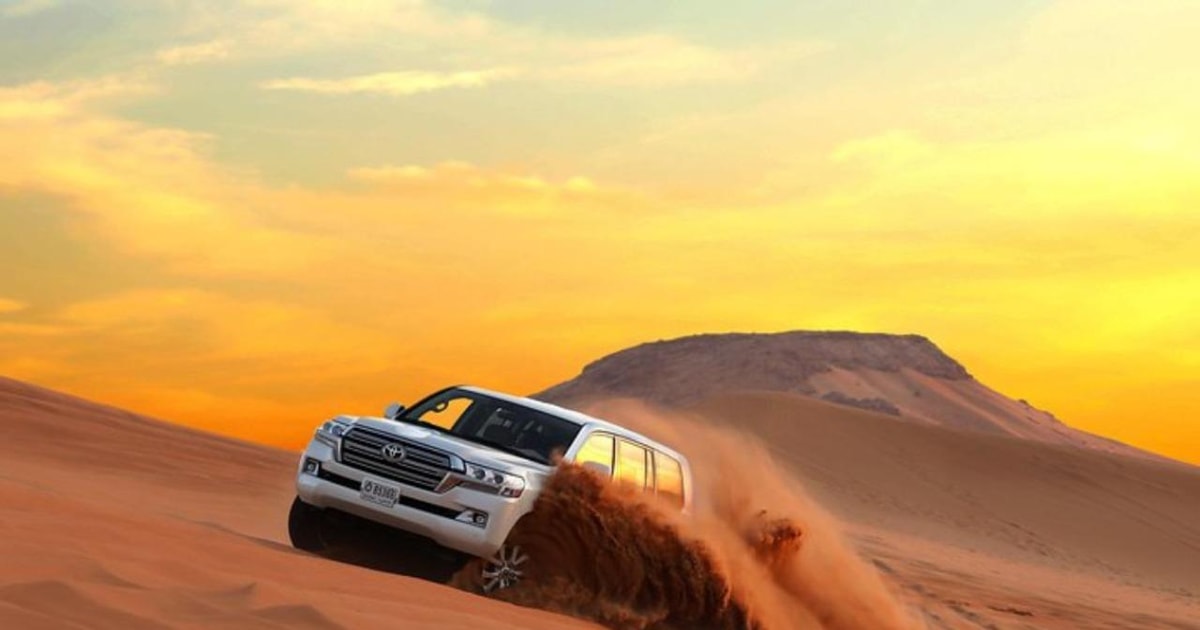 Dubai: Desert Ride, BBQ, Shows, Sandboarding & Camel Ride | GetYourGuide