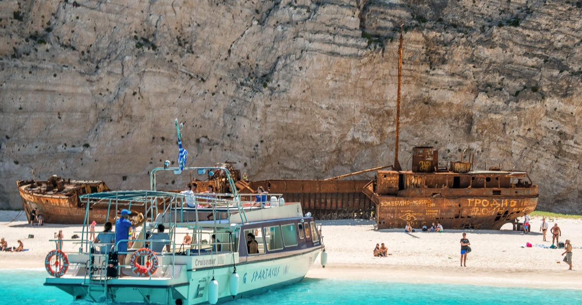 Zakynthos: Glass-Bottom Boat Tour to Shipwreck & Blue Caves | GetYourGuide