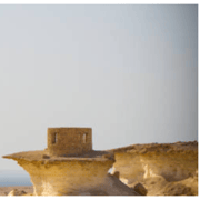 Doha:West tour to Richard Sierra sculpture, Umbrella Rock | GetYourGuide