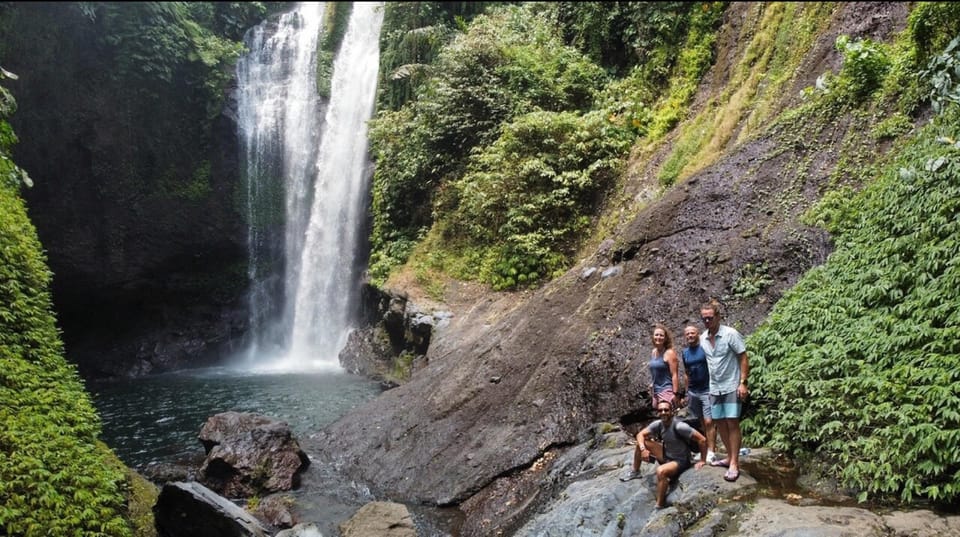 Jumping Sliding at Aling- Aling Waterfall and Handara Gate | GetYourGuide