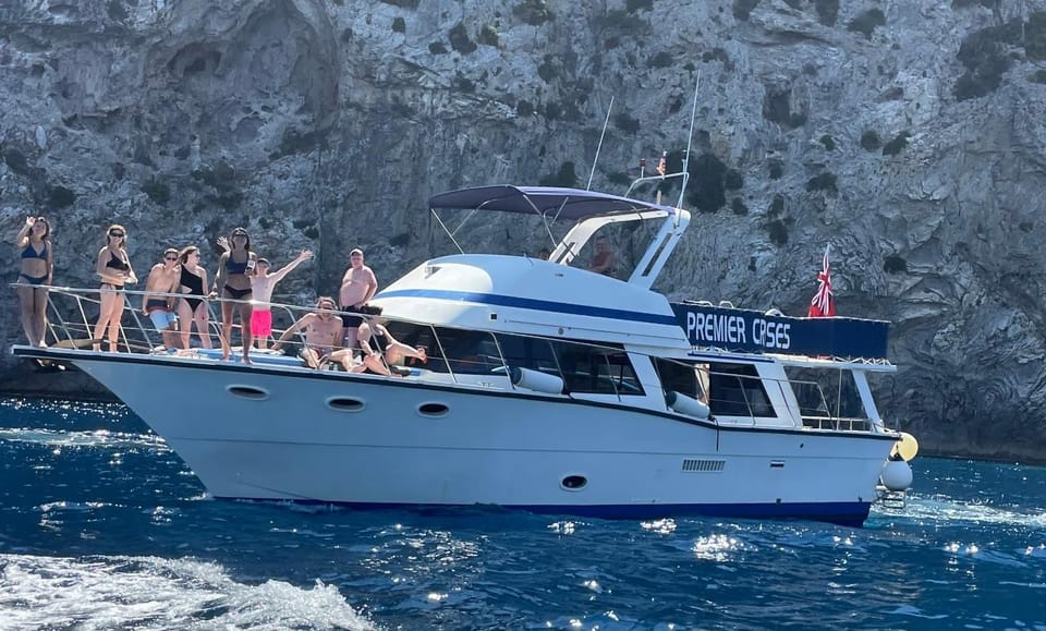 Alcudia: Boat Trip with Food, Drinks and Snorkel | GetYourGuide