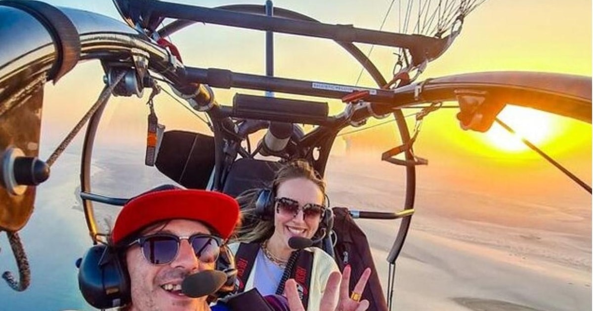 Qatar's Skybound Adventure: Exclusive Private Paratrike tour | GetYourGuide