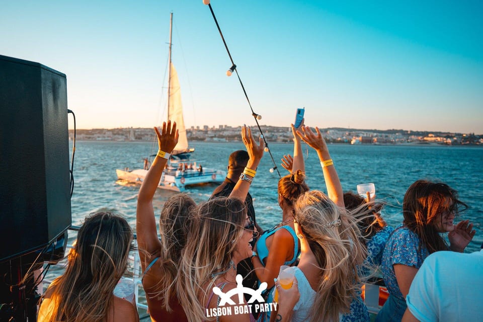 Lisbon: Day Boat Party with Live DJ and Night Club Entry | GetYourGuide