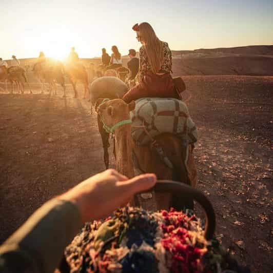 From Marrakesh: Agafay Desert Sunset, Camel Ride, and Dinner | GetYourGuide
