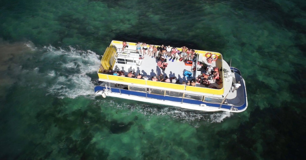 Catamaran with Snorkel, Open Bar, and Transfer From Cancún | GetYourGuide