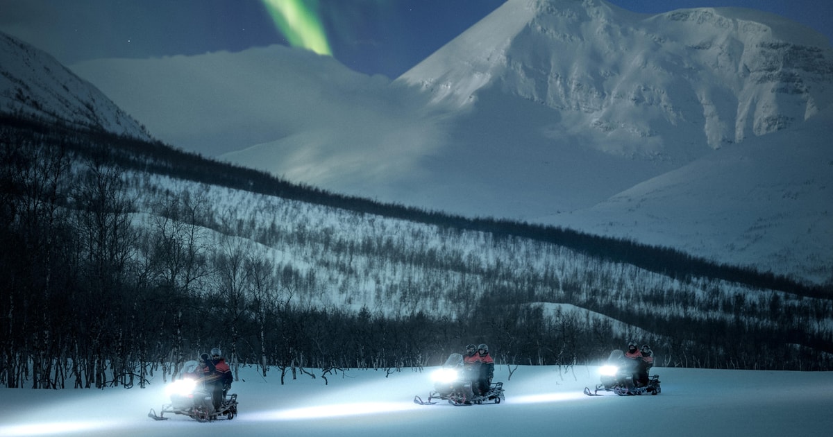 From Tromsø: Evening Snowmobiling Tour at Camp Tamok | GetYourGuide