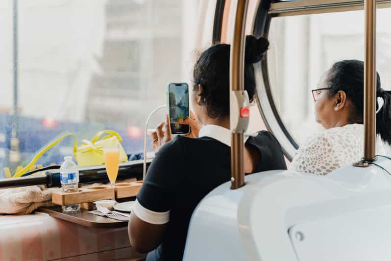 London: Afternoon Tea Bus with a Glass of Prosecco | GetYourGuide