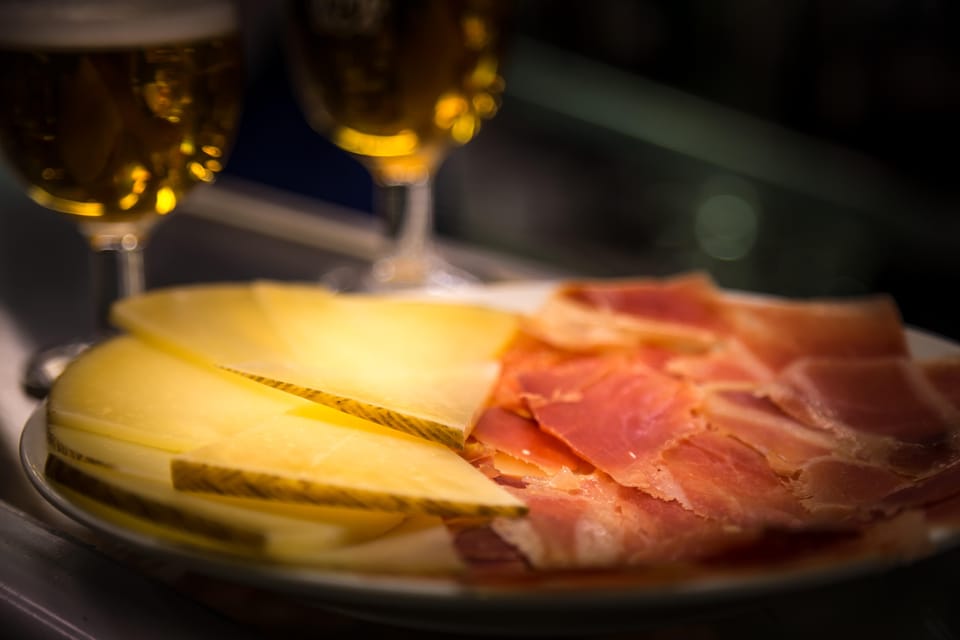 Madrid: Authentic Tapas Evening Tour with a side of History | GetYourGuide