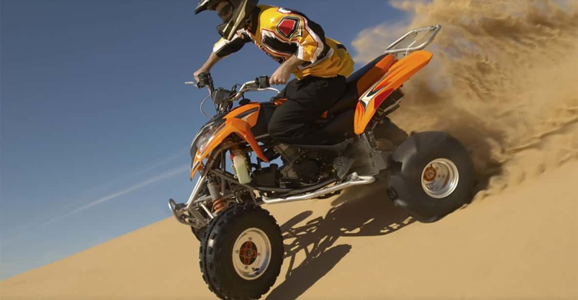 Dubai: Desert Safari, Quad Bike, Camel Ride and Sandboarding | GetYourGuide