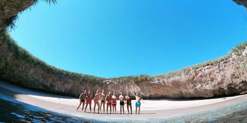 Plongée avec masque et tuba et visite de la plage cachée de Puerto ...