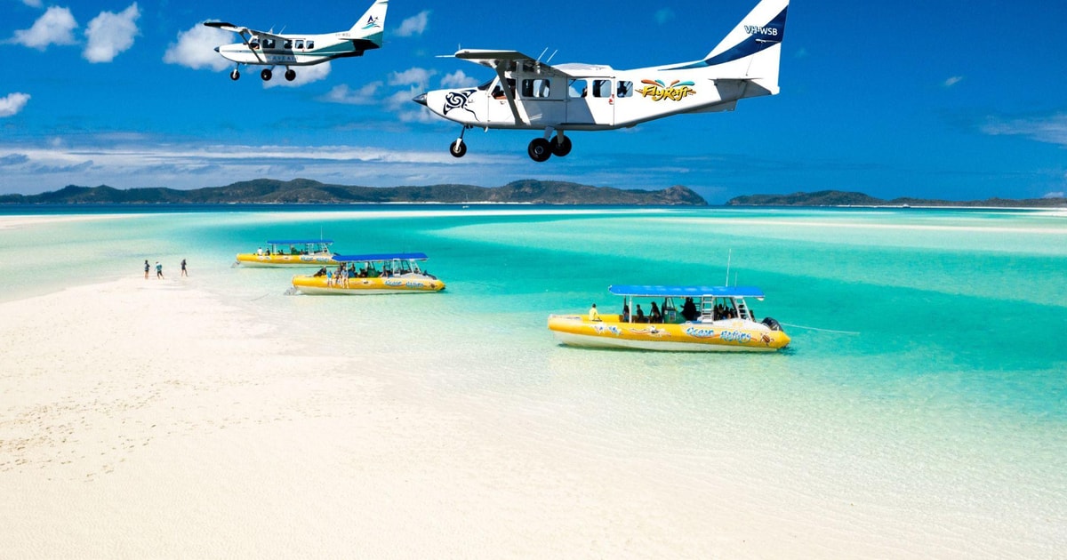 Airlie Beach: Fly Raft-pakke med naturskøn flyvning og snorkling ...