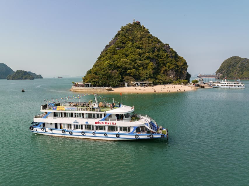 Hanoi: Halong Bay Day Trip with Titop Island, Cave, & Kayak | GetYourGuide