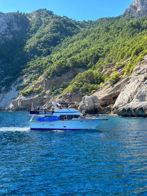 Alcudia: Boat Trip with Food, Drinks and Snorkel | GetYourGuide