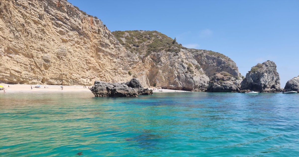Sesimbra: Taxi Boat Ribeiro do Cavalo Beach - Round trip | GetYourGuide