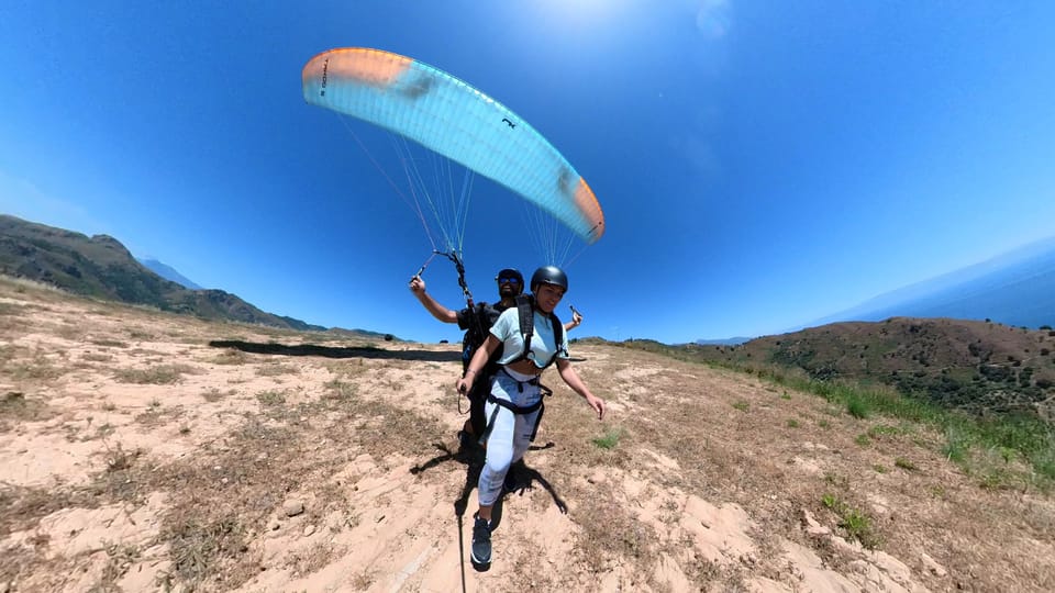 Paragliding Tandem Taormina + Video/Foto e GoPro + Acrobazia | GetYourGuide