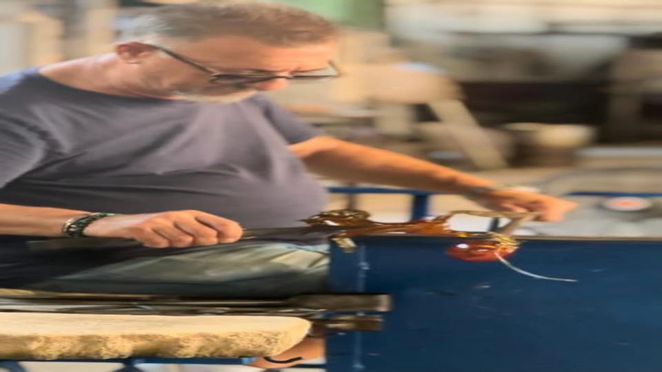 Demonstration of the art of blowing&sculpting Murano glass! | GetYourGuide
