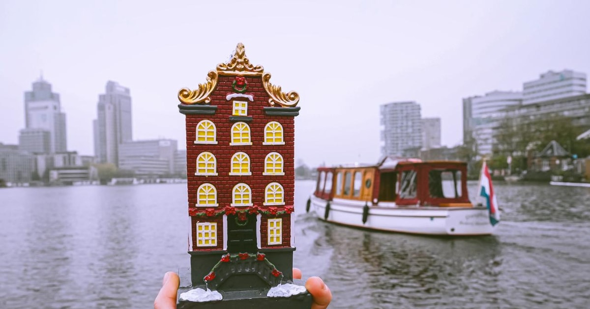 Tour in barca sui canali di Amsterdam con guida dal vivo | GetYourGuide
