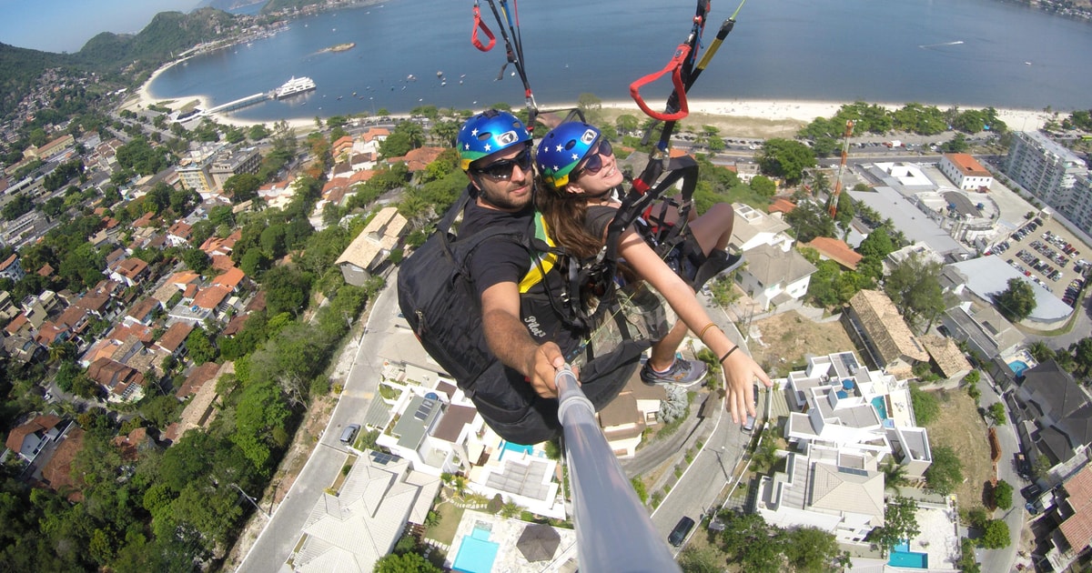 Paragliding in Niterói with an experienced instructor and a view of Rio ...