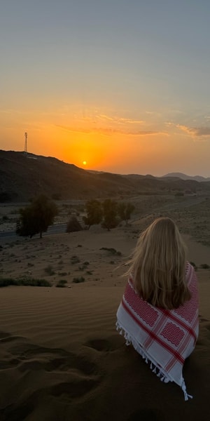 Sunset in desert with pick up | GetYourGuide