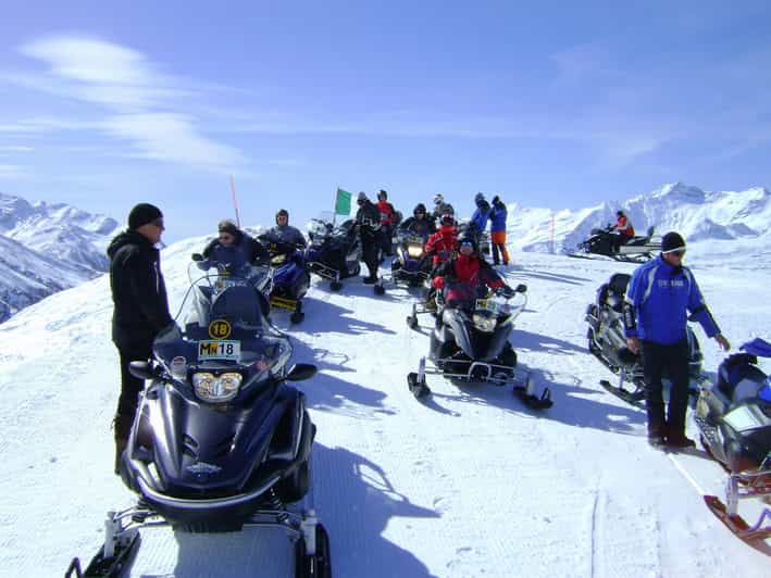 Snowmobile Tour Madesimo / Splügen Pass (Daytrip St. Moritz) | GetYourGuide