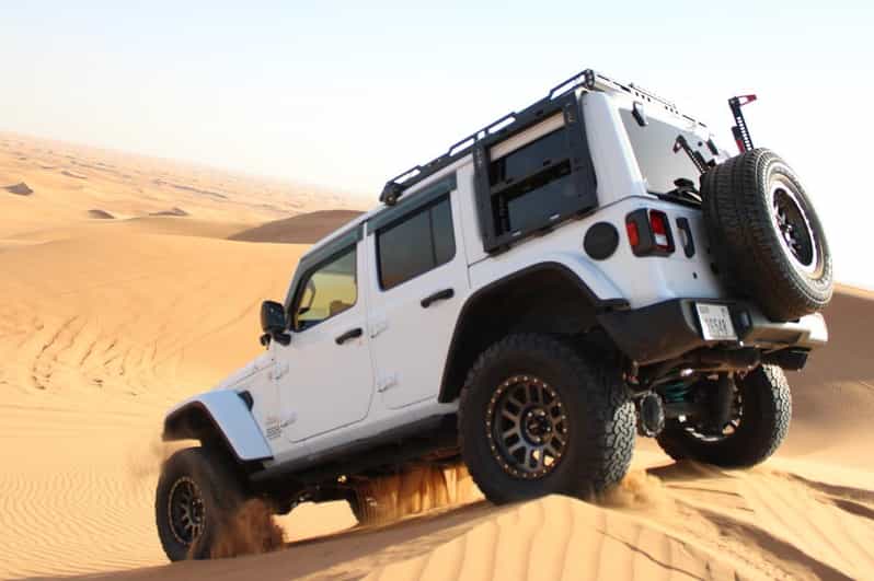 Dubai Jeep Wrangler Sunset Desert Experience & Sandboarding | GetYourGuide