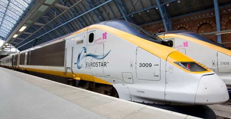 From London: Eiffel Tower, Notre Dame & Louvre Day Tour | GetYourGuide