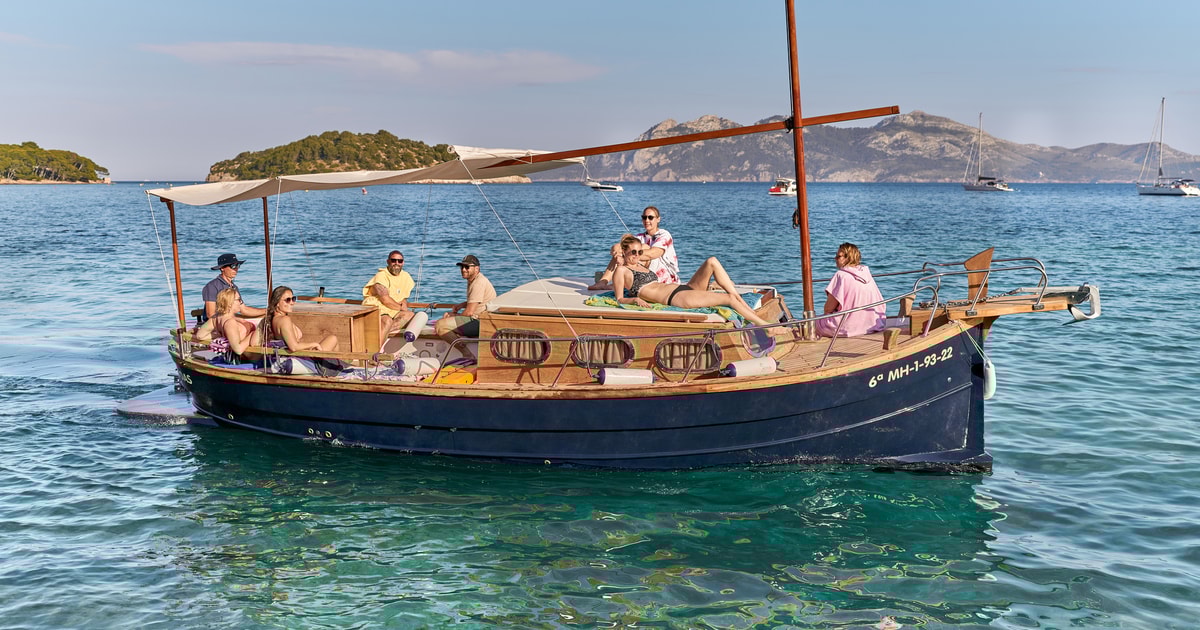 Midnight Swim on a Traditional Boat with Off the Path | GetYourGuide