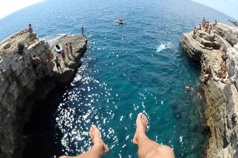 Pula: Half-Day Kayak, Cliff, and Cave Tour | GetYourGuide