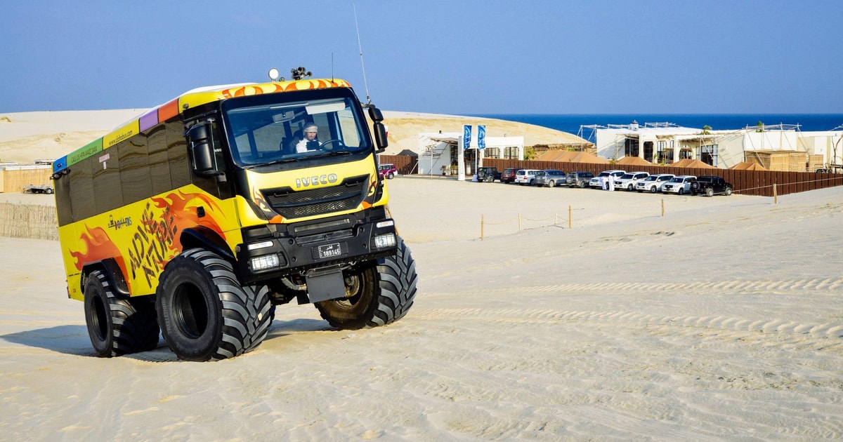 Monster Bus Desert Safari with Day Pass at Al Majles Resort | GetYourGuide