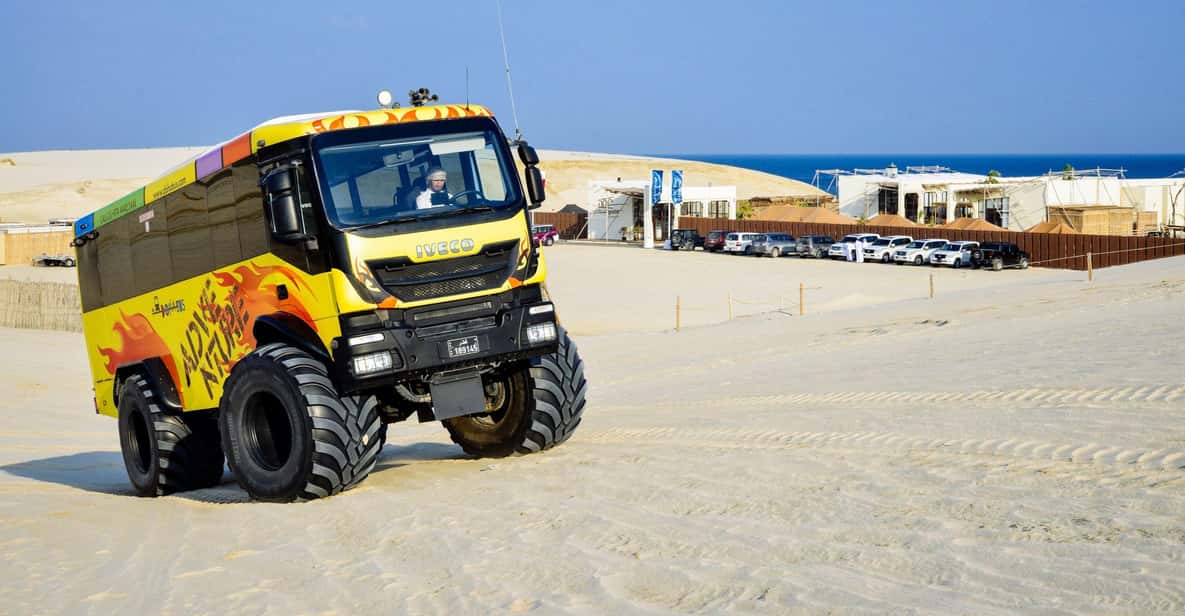 Monster Bus Desert Safari with Day Pass at Al Majles Resort | GetYourGuide
