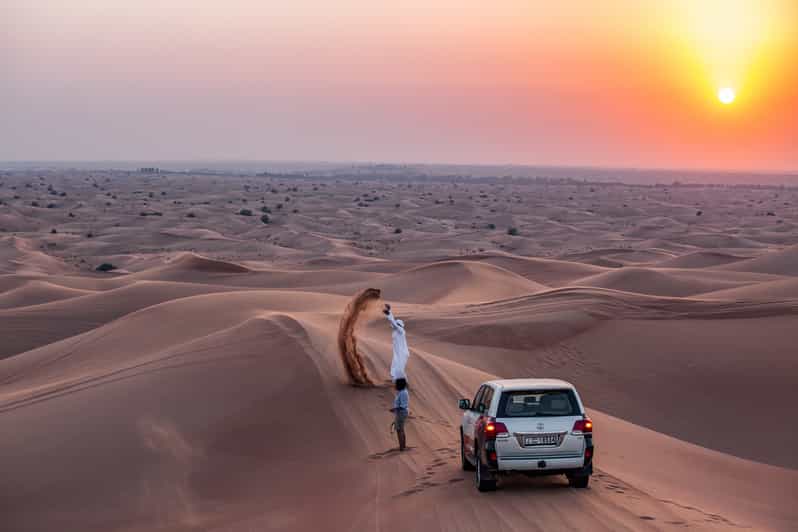 Dubai: 4WD Desert Safari Tour with BBQ Dinner and Live Show | GetYourGuide