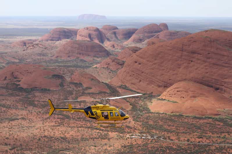 Yulara: Uluru and Kata Tjuta Sunset Helicopter Tour | GetYourGuide