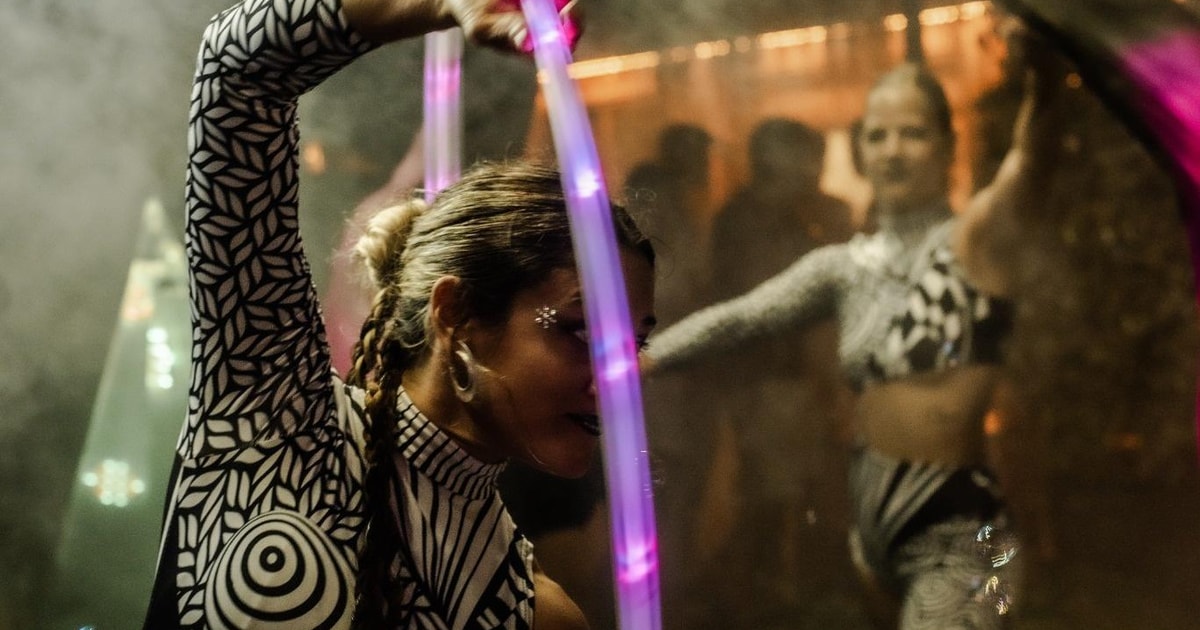 Malaga: Paradox, an immersive party with techno music and live art. | GetYourGuide