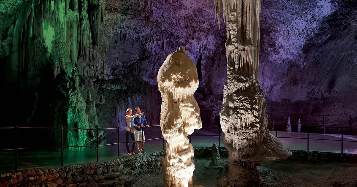 Da Trieste: Grotte di Postumia e Castello di Predjama | GetYourGuide