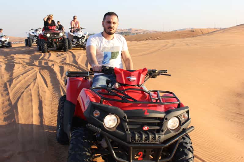 From Dubai: Morning ATV Quad Biking Desert Safari Adventure | GetYourGuide