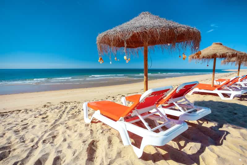 Boat trip from Faro to Ilha Deserta by Ferry | GetYourGuide