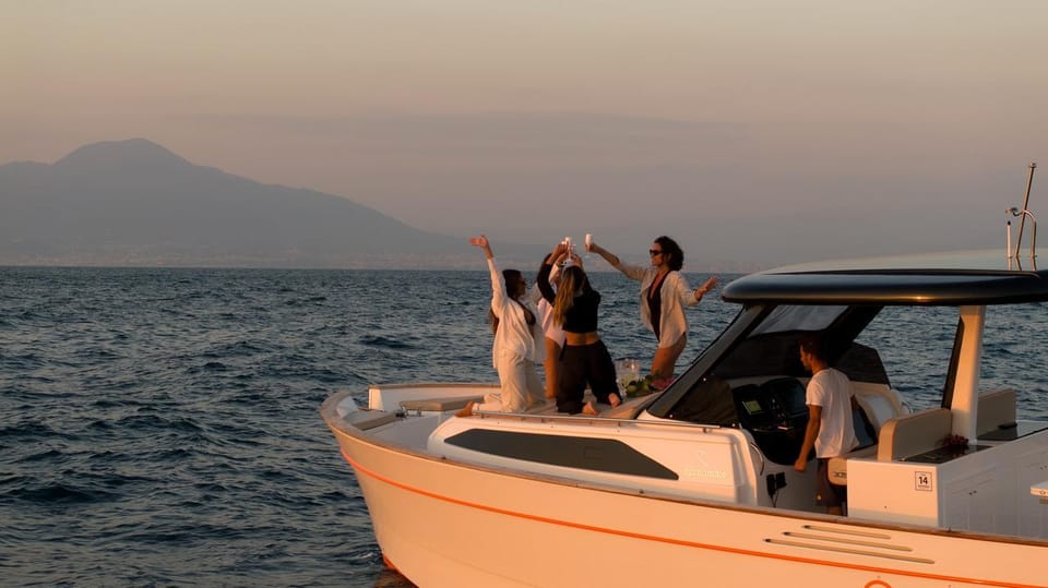 From Positano: Private Tour to Capri on a 2024 Gozzo Boat | GetYourGuide