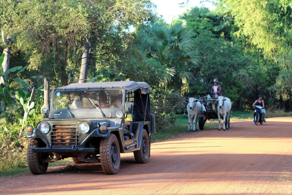 Angkor Wat in a vintage Jeep with driver - jeep rental | GetYourGuide