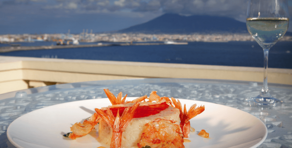 Naples: romantic dinner on the rooftop terrace | GetYourGuide