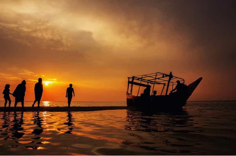 Doha: traditional Dhow Harbour, Skyline view , Sunset | GetYourGuide