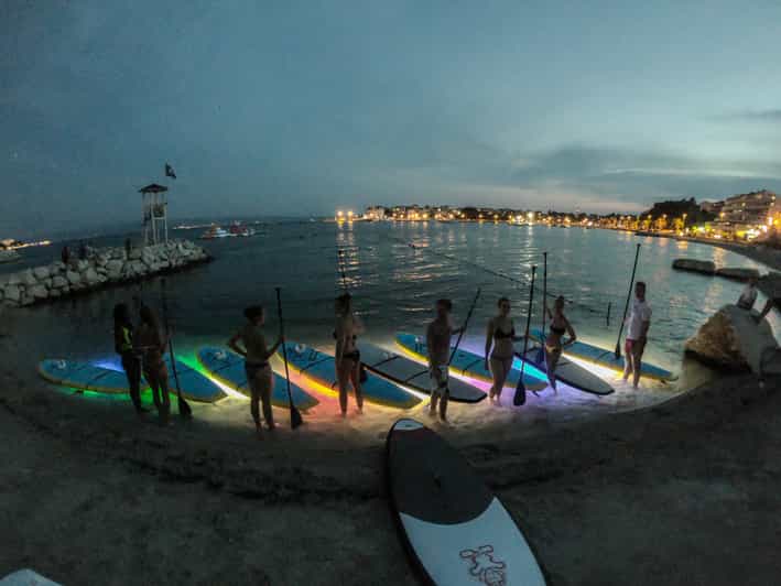 Split: Stand Up Paddleboard Night Glow Tour | GetYourGuide