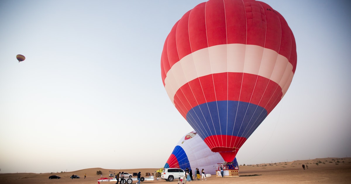 Dubai: Hot Air Balloon Ride with Camel Ride & Falcon Photo | GetYourGuide