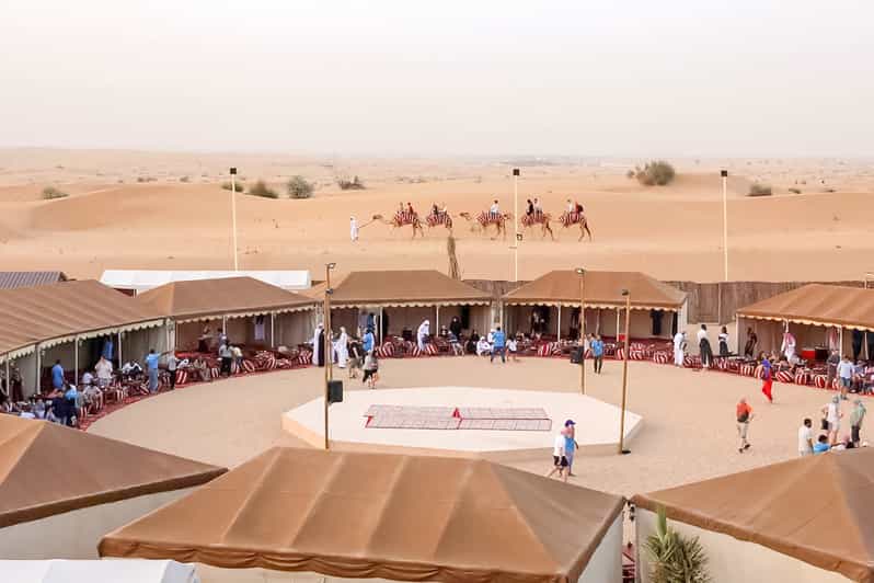 From Dubai: Red Dunes and Camel Safari with Overnight Camp | GetYourGuide